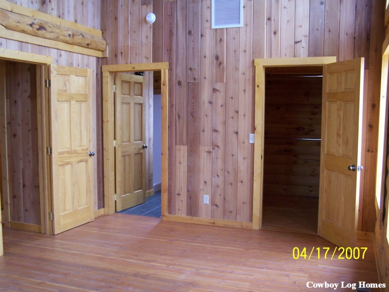 Western Red Cedar Doorway and Interior | Cowboy Log Homes
