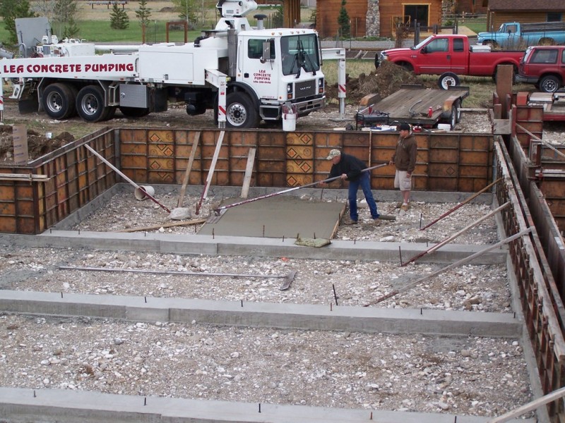 Installing log home foundation | Cowboy Log Homes