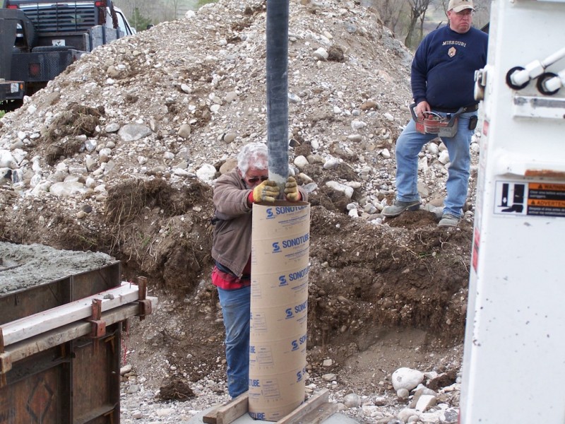 Installing log home foundation | Cowboy Log Homes
