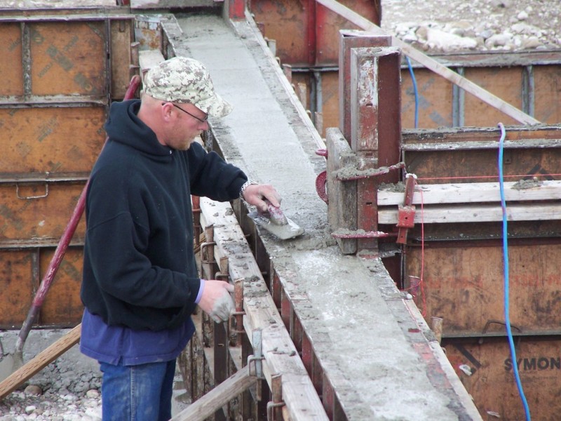 Installing log home foundation | Cowboy Log Homes